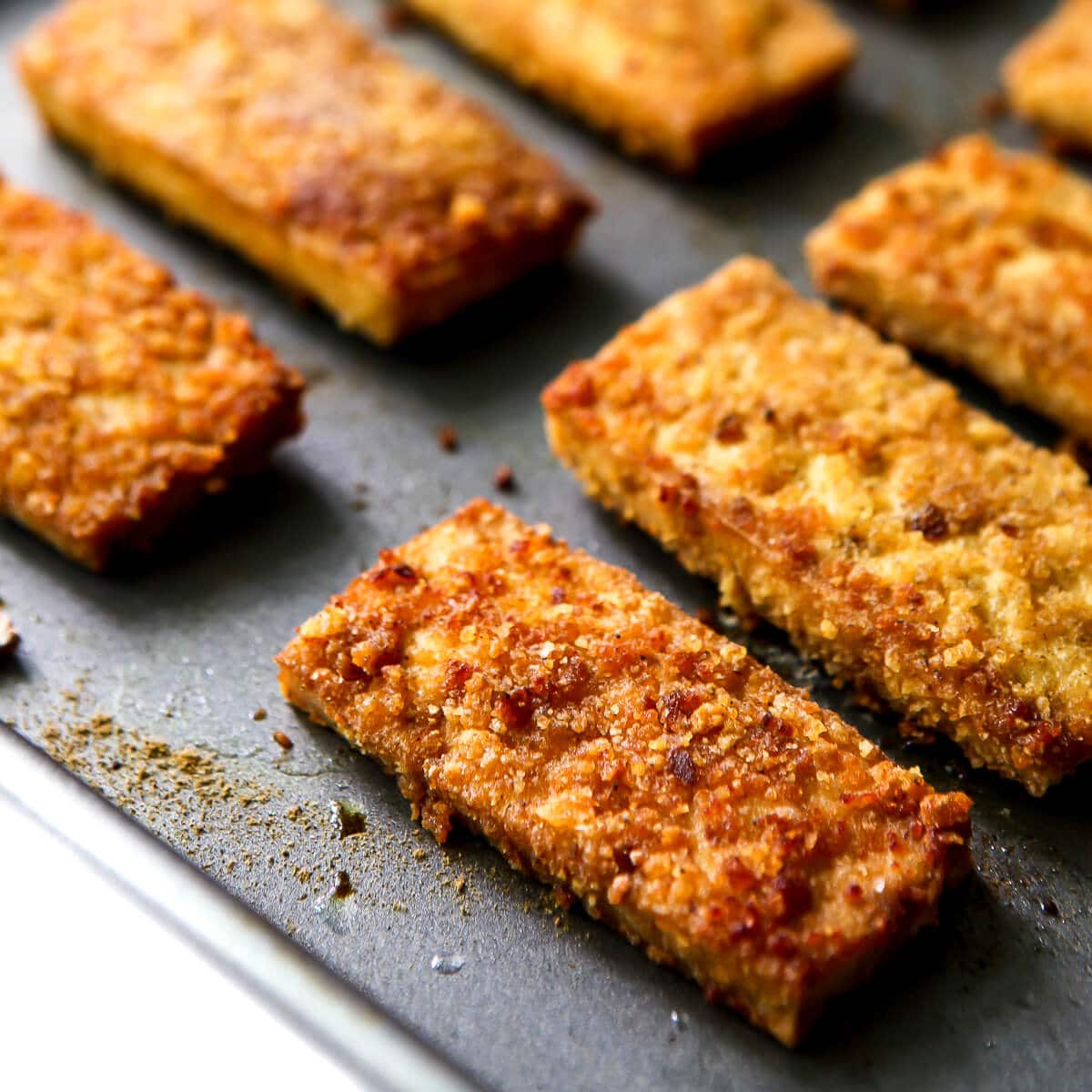 How do you get crumb to stick to tofu?