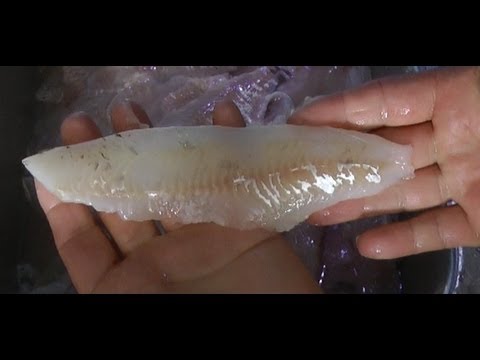 How do you get fish slime out of canned food?