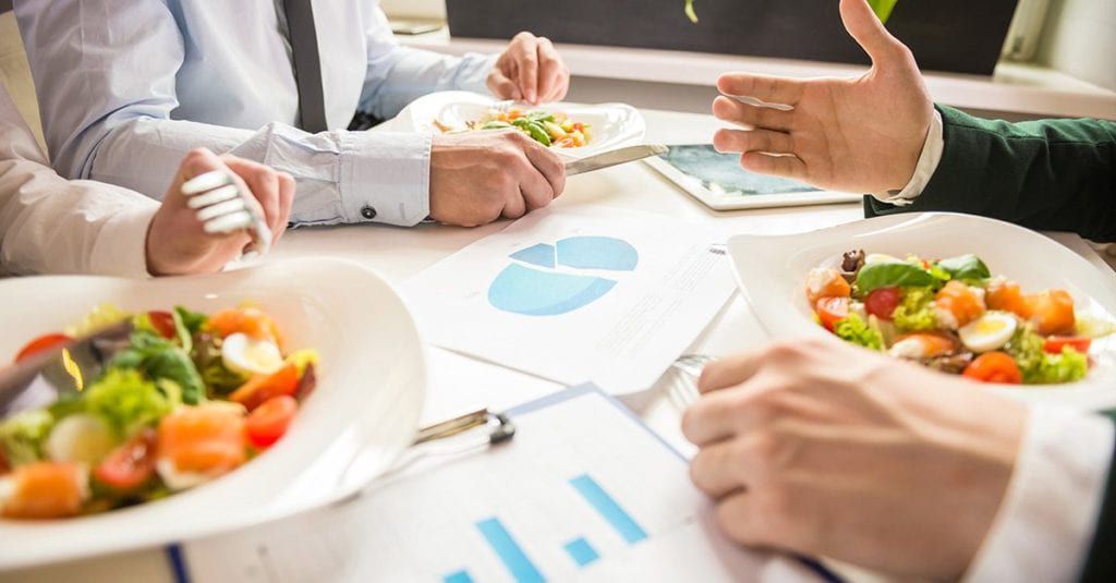 How do you get new clients to attend a business lunch?