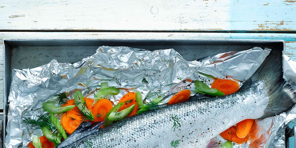 How do you get rid of moisture on fish before cooking?