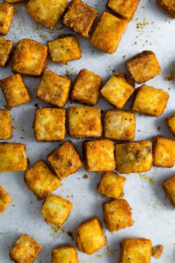 How do you get seasoning to stick to tofu?