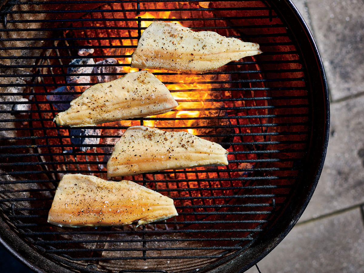 How do you grill white fish on a charcoal grill?