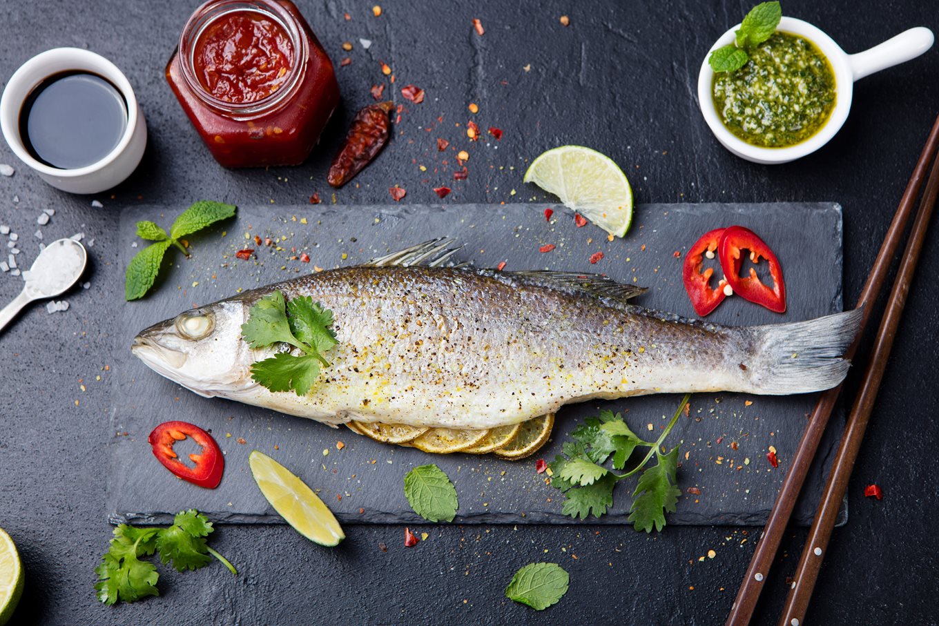 How do you handle fish safely when cooking?