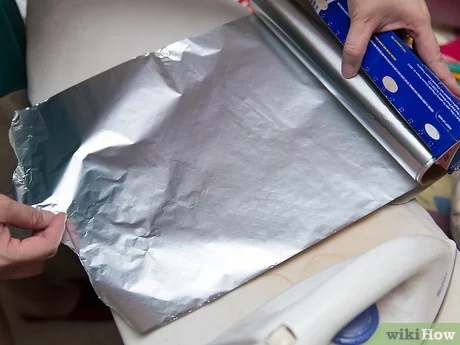 How do you heat something wrapped in foil?