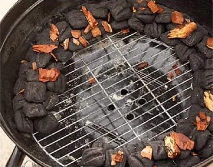 How do you heat up coals for smoking meat?