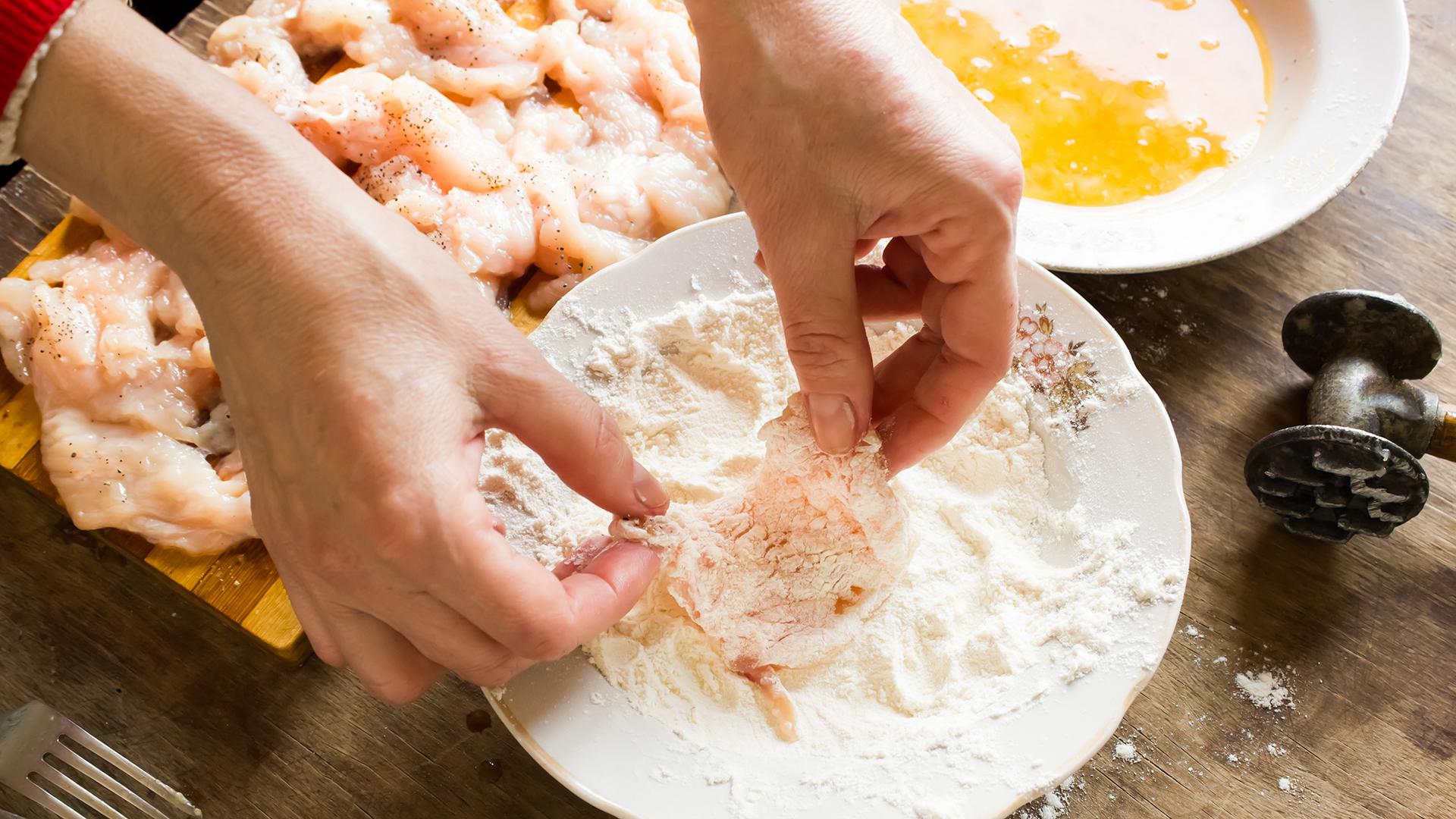 How do you keep breading from falling off fried chicken?