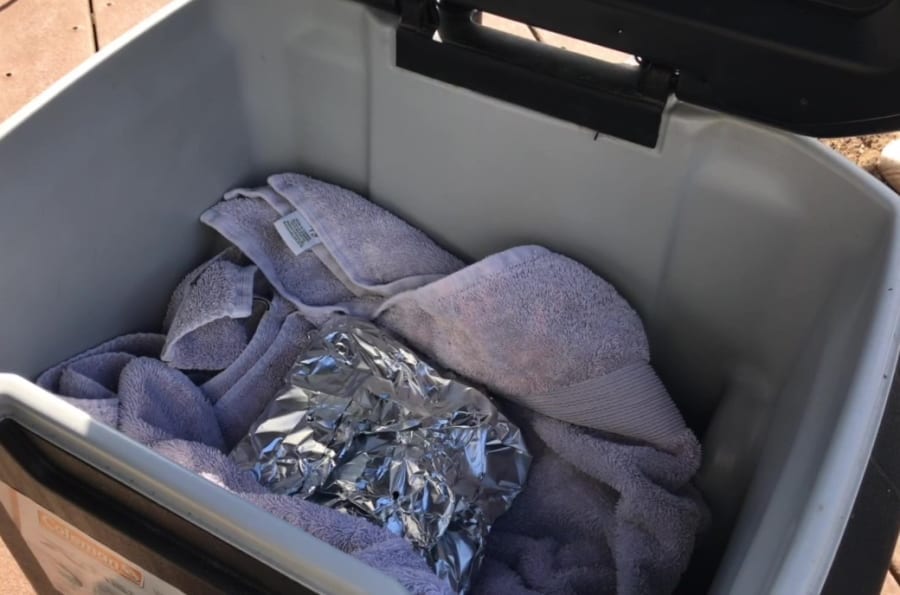 How do you keep brisket warm in a cooler?