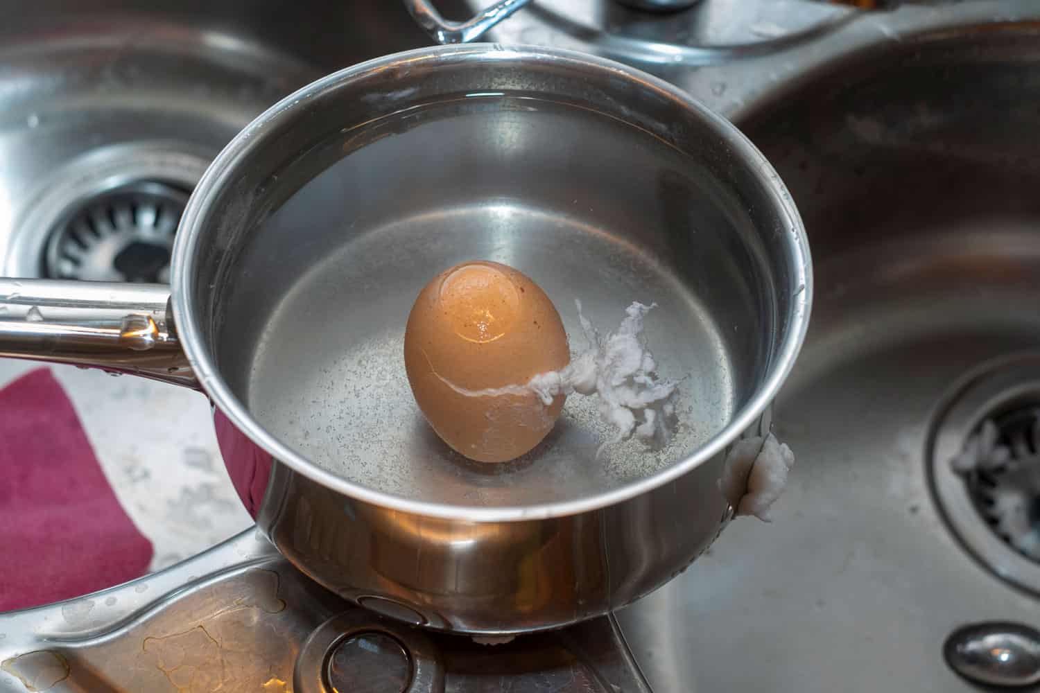 How do you keep eggs from cracking when soft boiling?