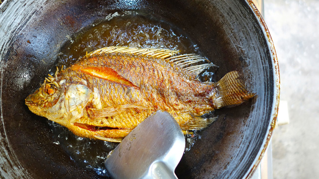 How do you keep fish from breaking when frying?