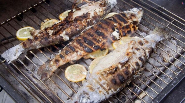 How do you keep fish from sticking to grill grates?