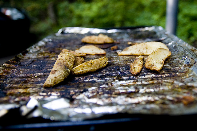 How do you keep food from sticking to aluminum foil?