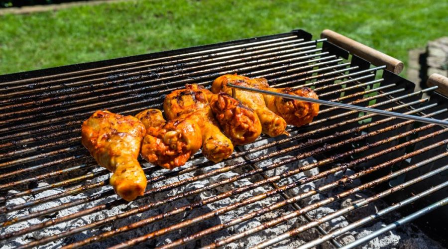 How do you keep food from sticking to the grill grates?