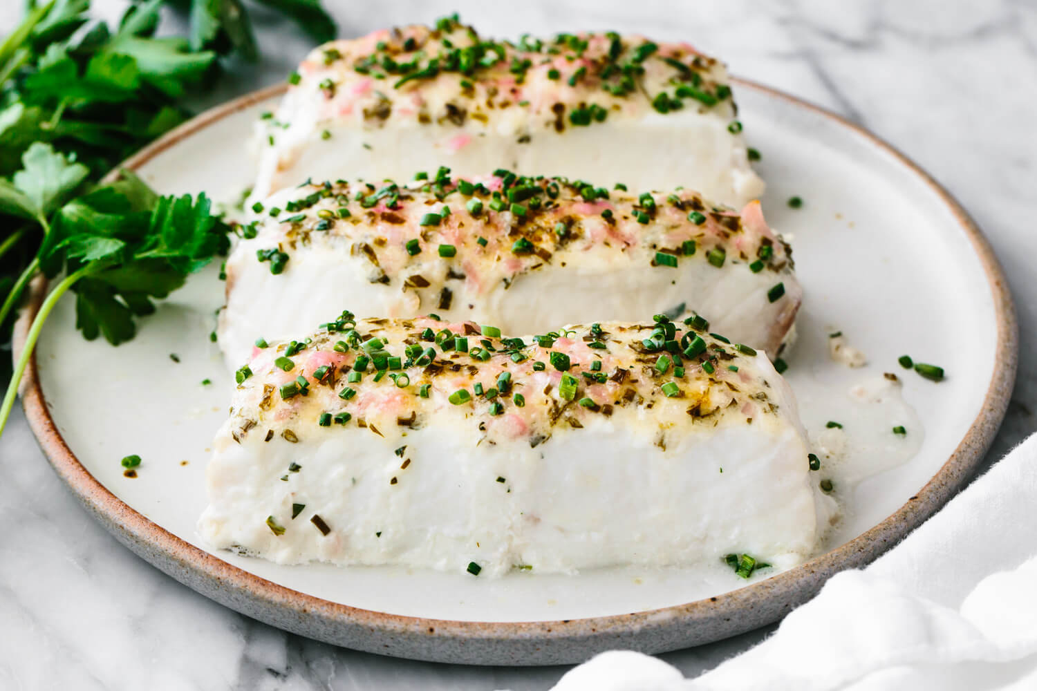 How do you keep halibut moist when cooking?