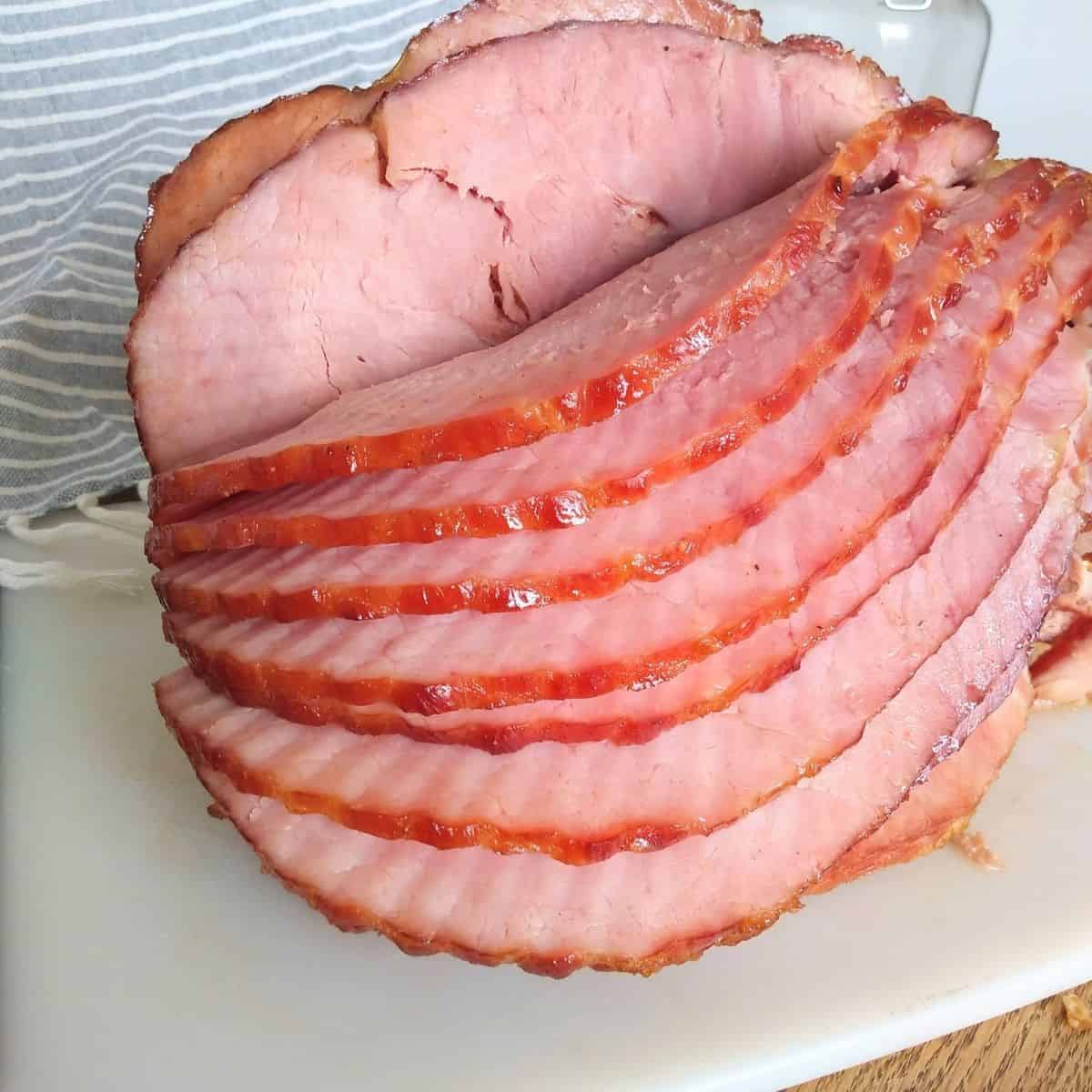 How do you keep ham fresh after slicing?