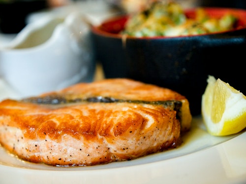 How do you keep salmon from exploding in the microwave?