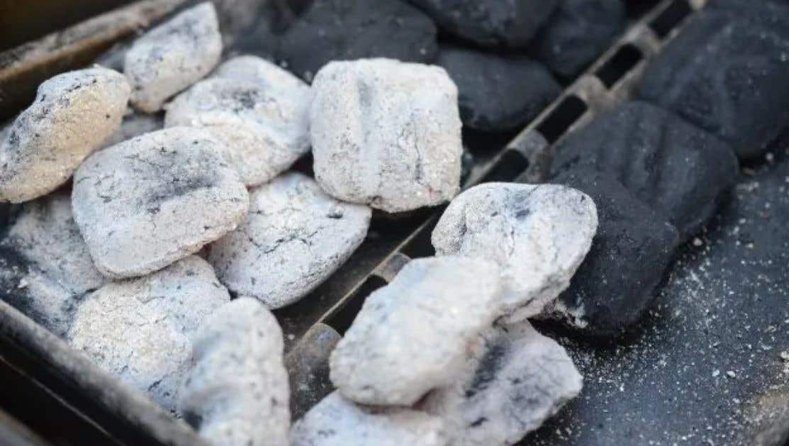 How do you know when a charcoal grill is ready?