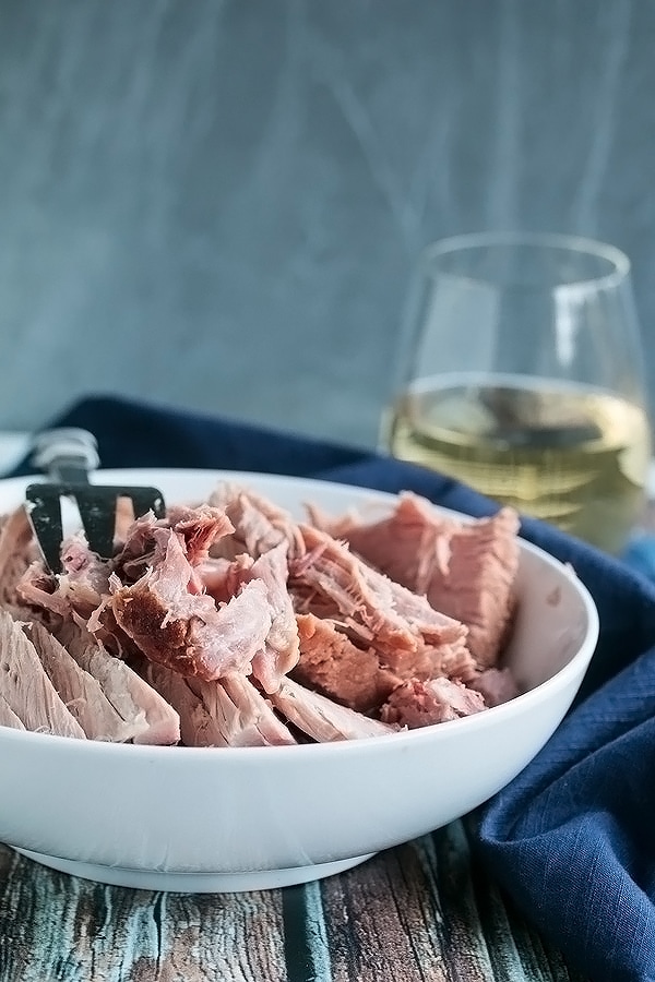 How do you know when boiled ham is done?