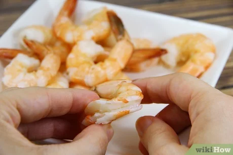 How do you know when precooked shrimp is done?
