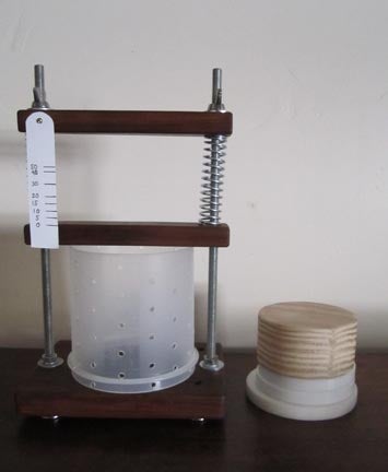 How do you make a simple cheese press?