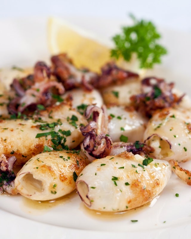 How do you make squid tender when cooking?