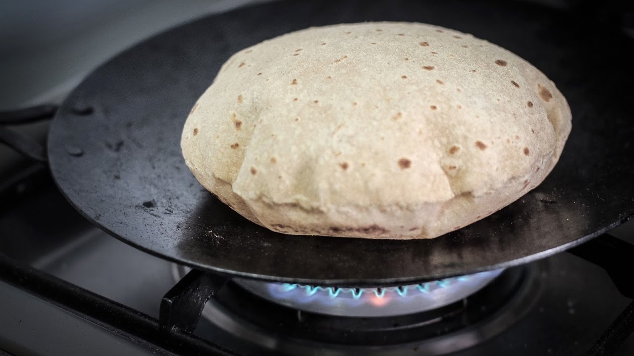 How do you make your rotis puff up?