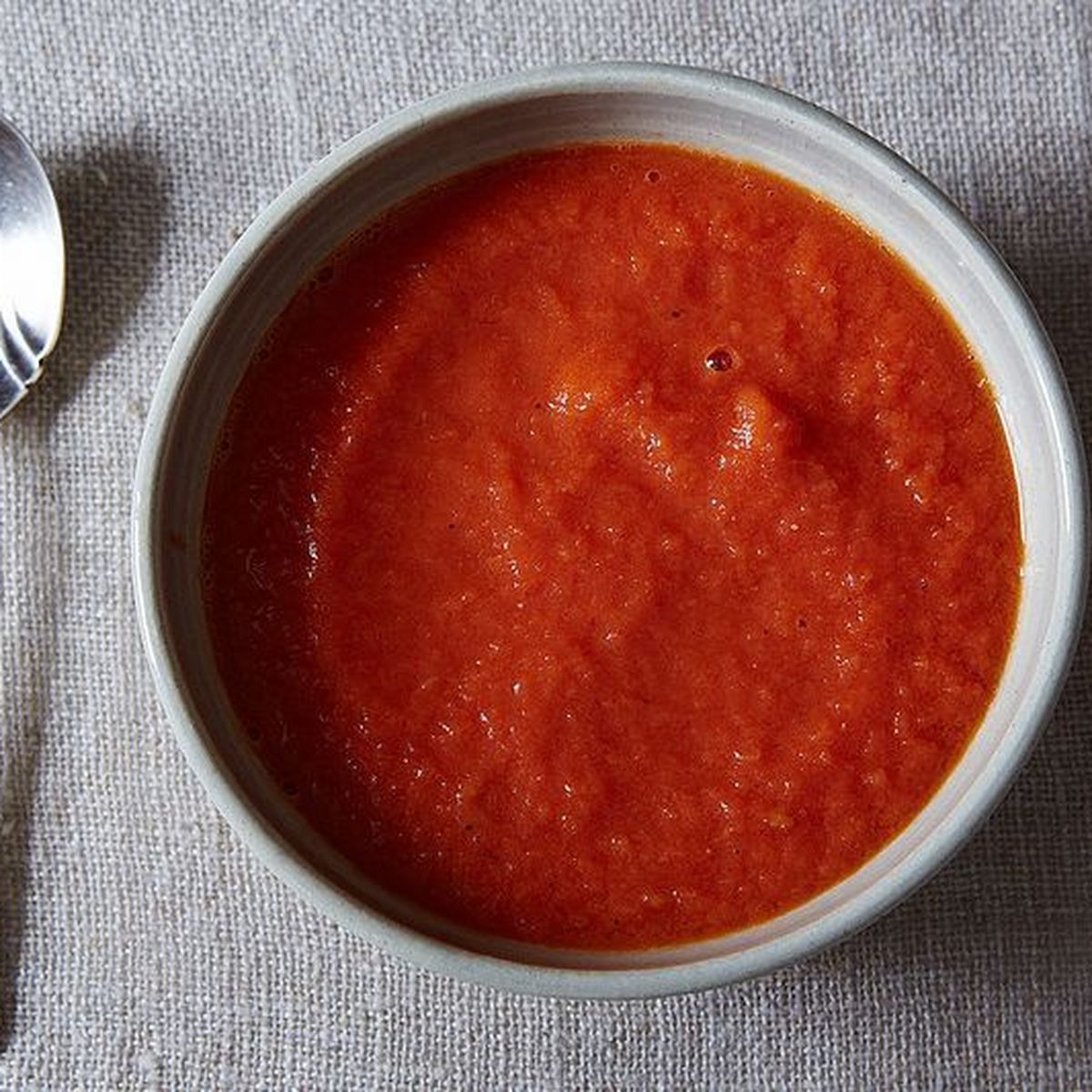 How do you neutralize the acid in tomato soup?