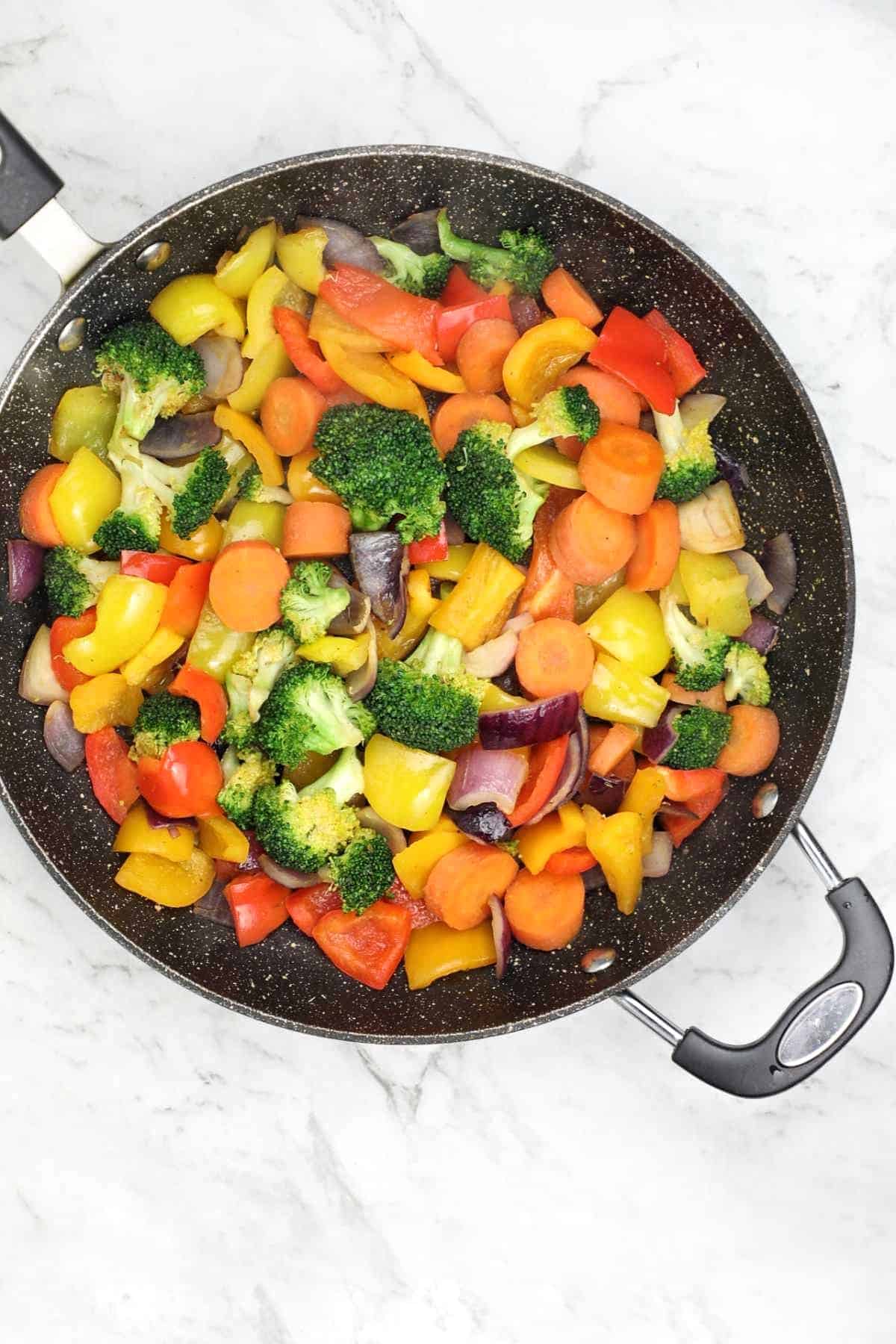 How do you pan fry vegetables on the stove?