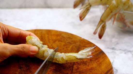 How do you peel shrimp so they don’t shrink?