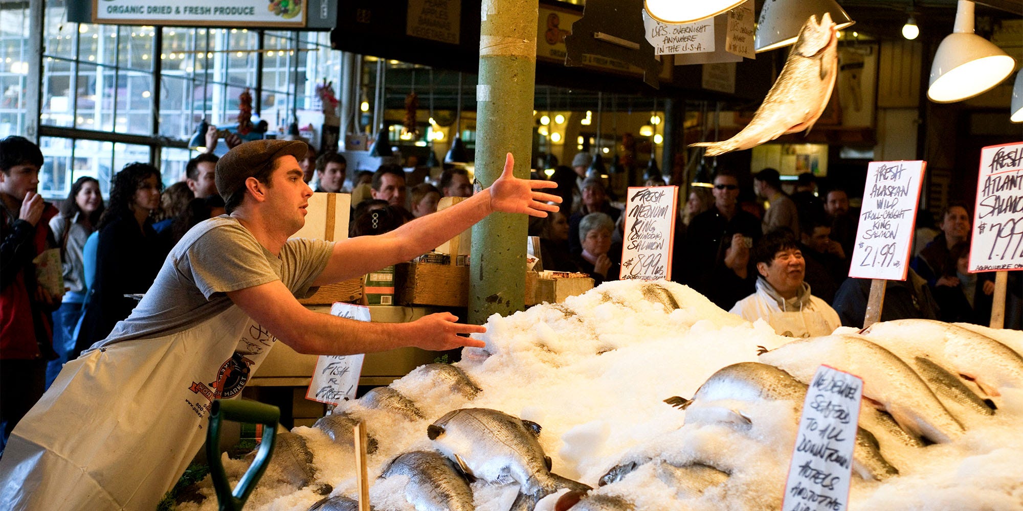 How do you pick up fish at a fish market?