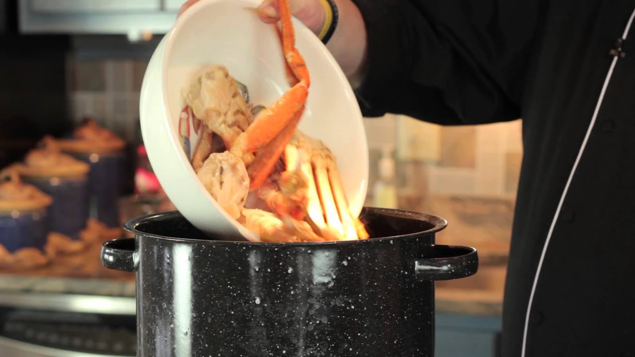 How do you prepare cooked crab legs for freezing?