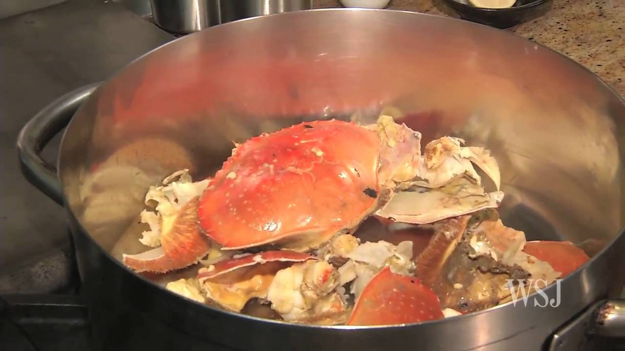 How do you prepare crabs for cooking?