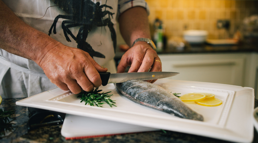 How do you prepare fresh fish for cooking?