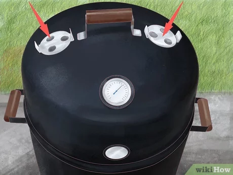How do you put heat in a smoker?
