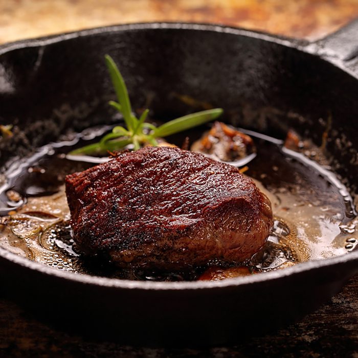 How do you put liquid smoke on a steak?