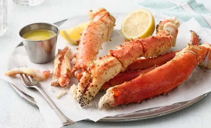 How do you refrigerate cooked crab legs?