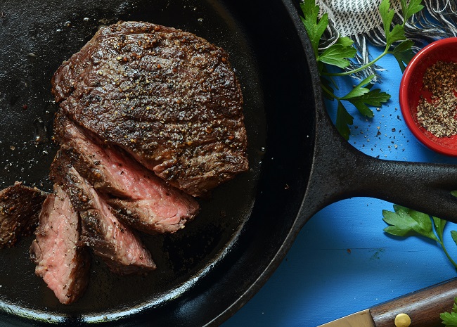 How do you reheat a medium-rare steak?