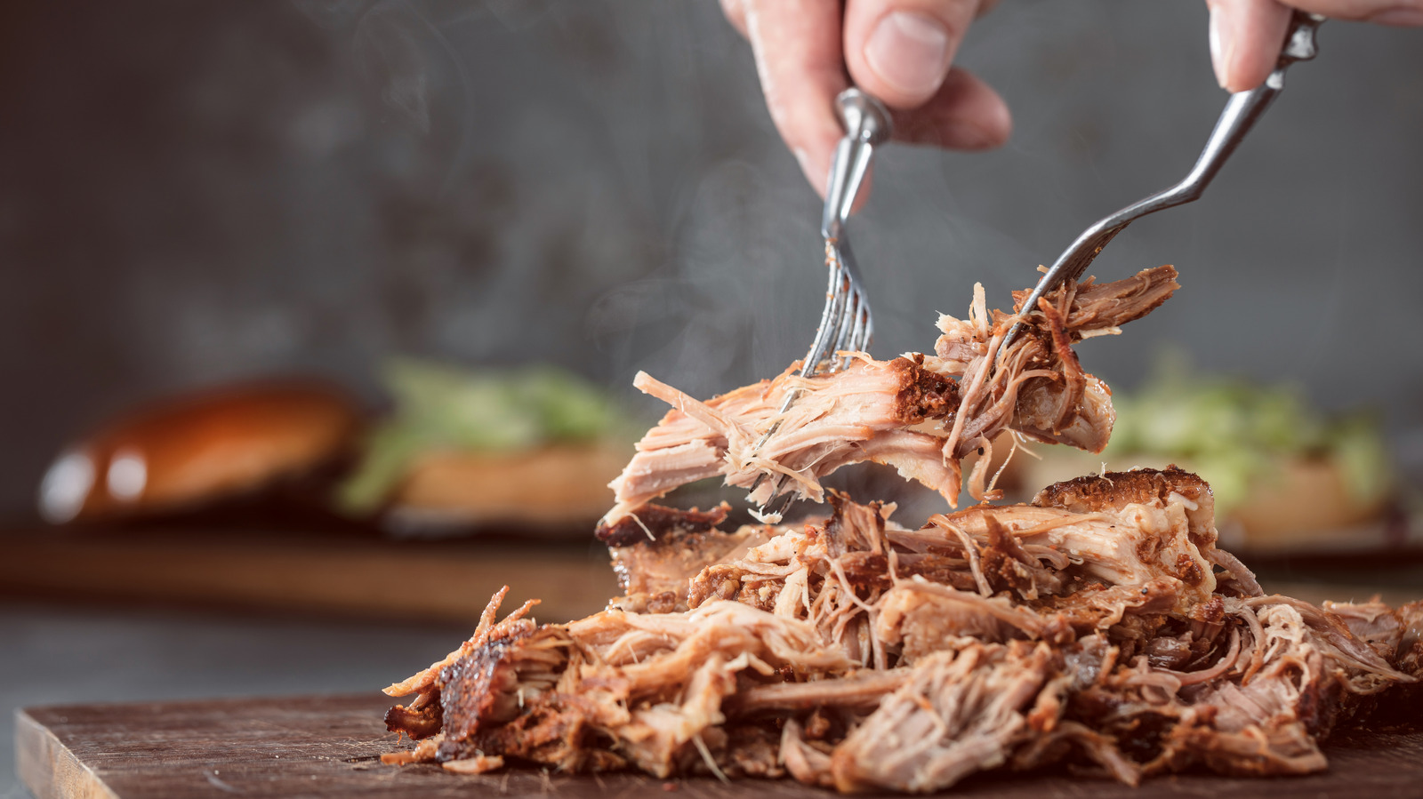 How do you reheat a pork shoulder without drying it out?