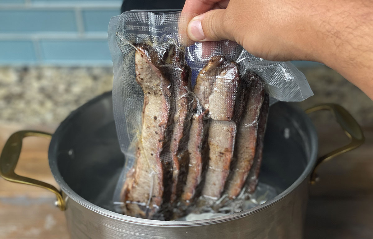 How do you reheat brisket in water?