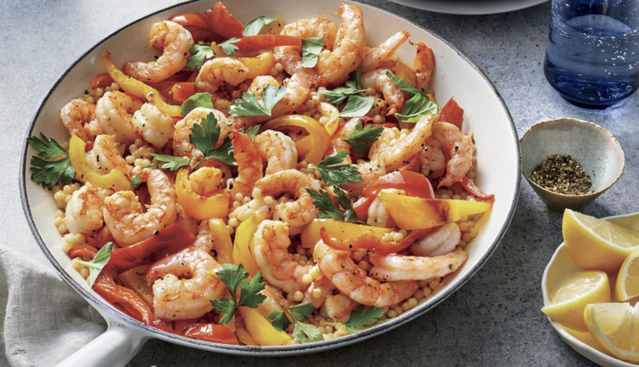 How do you reheat cooked shrimp without drying it out?