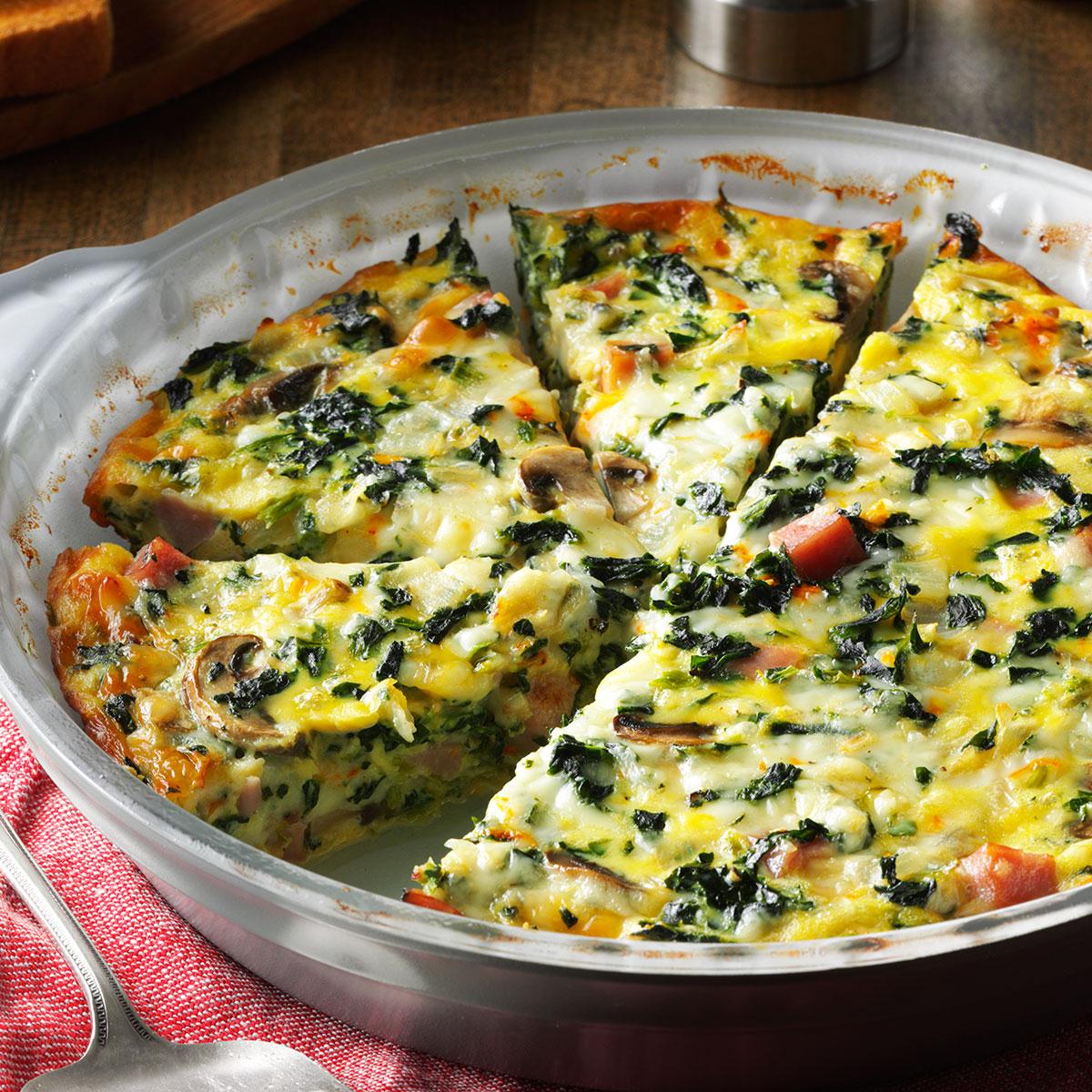 How do you reheat crustless spinach quiche?