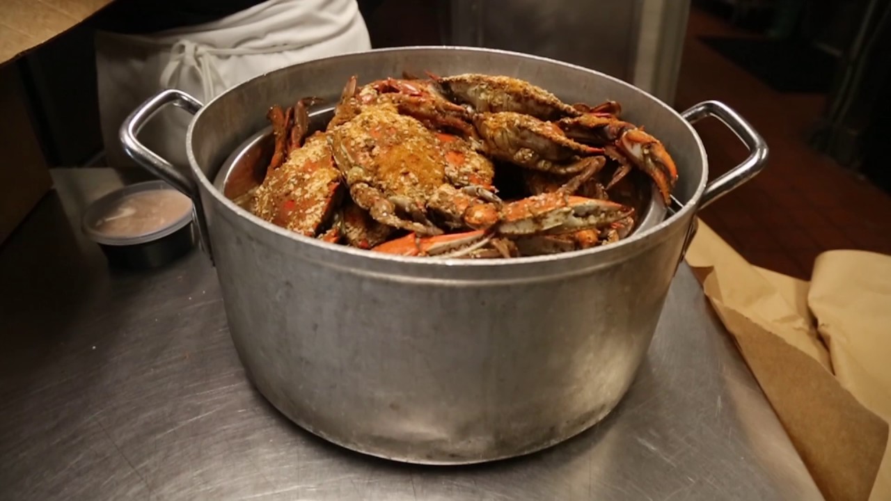 How do you reheat frozen whole crabs?