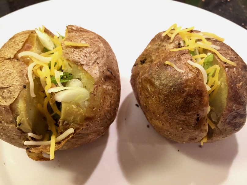 How do you reheat leftover baked potatoes?