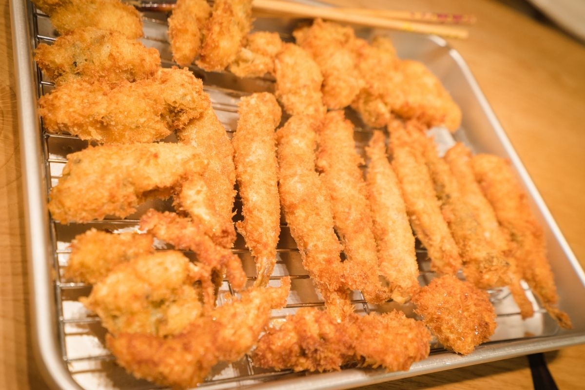 How do you reheat leftover fried shrimp?