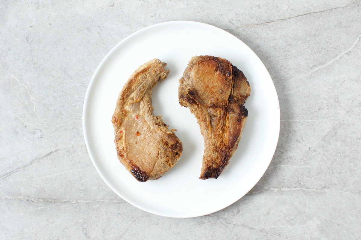 How do you reheat pork chops so they don't dry out?