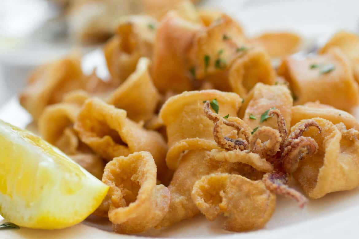 How do you reheat sauteed calamari?