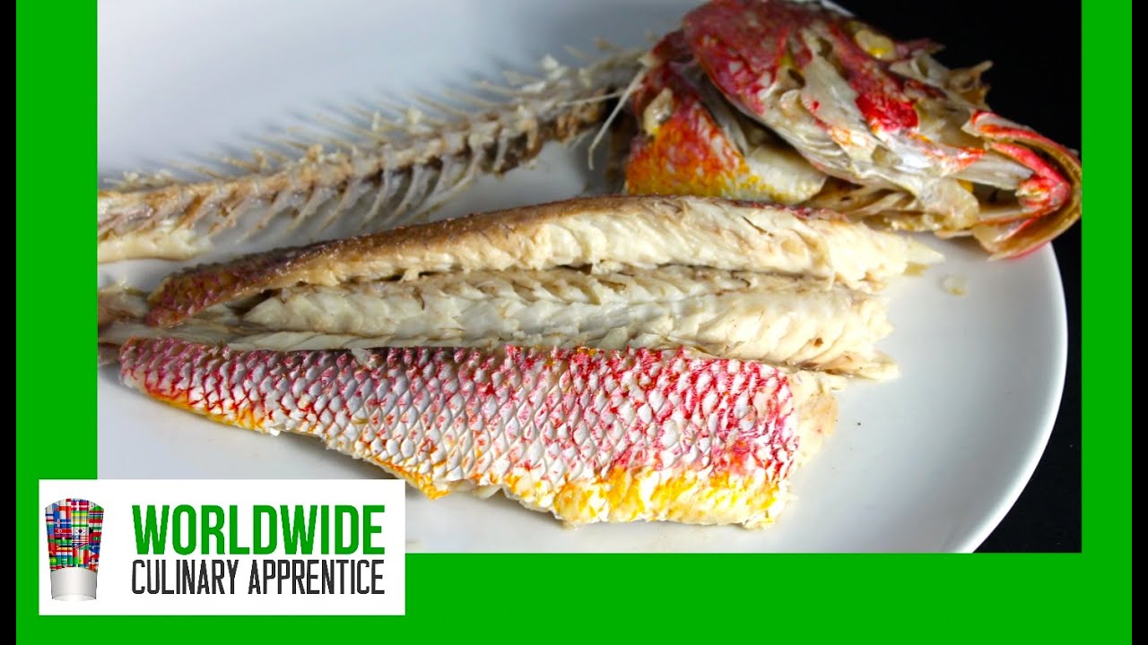 How do you remove the bones from a cooked fish?
