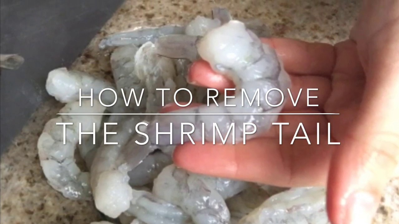 How do you remove the tail from cooked shrimp?