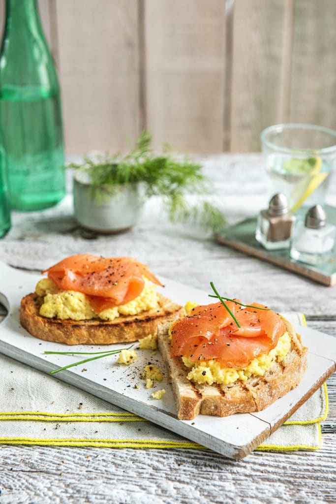 How do you serve and eat smoked salmon?