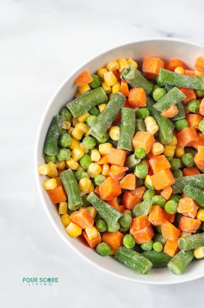How do you spice up canned mixed vegetables?