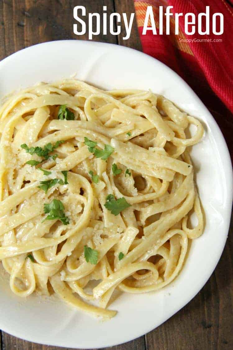 How do you spice up plain Alfredo?